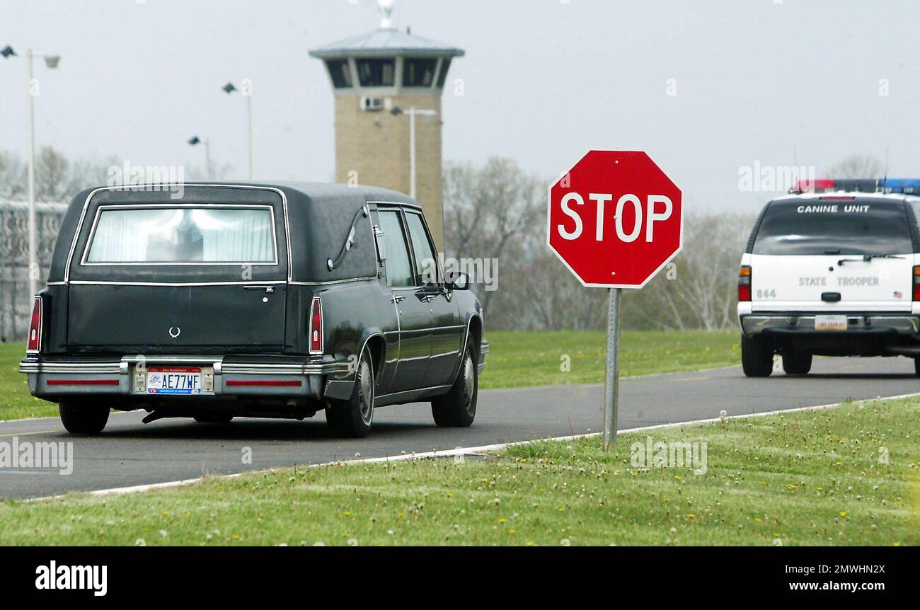 FILE – In this April 24, 2007, file photo, a hearse carries the body of ...