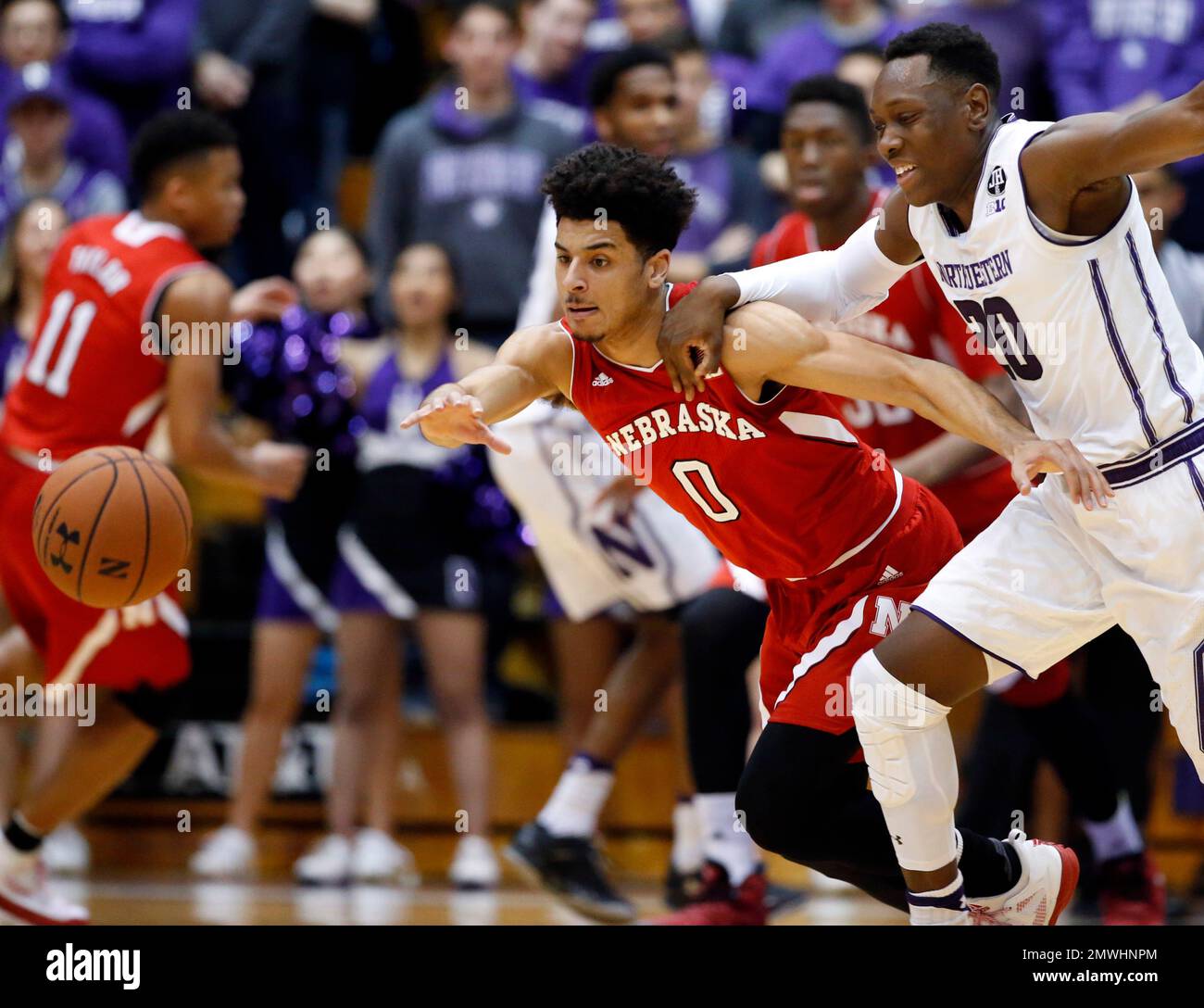 Nebraska guard Tai Webster, left, steals the ball from Northwestern ...