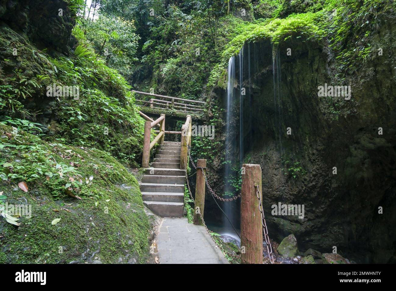 A view of stairs and a bridge on a river in green park Stock Photo - Alamy