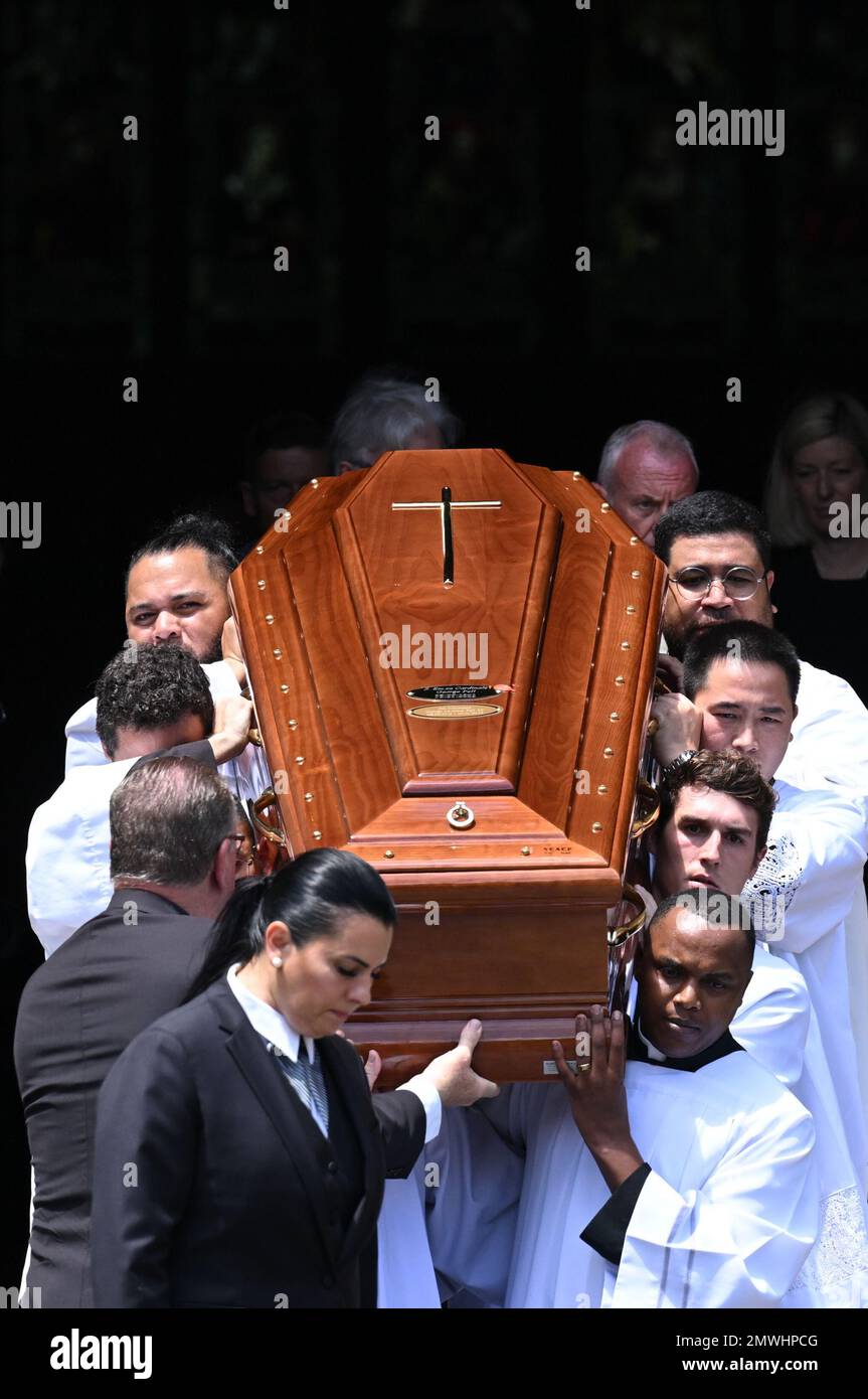 The casket of Cardinal George Pell is carried from St. Mary’s Cathedral ...