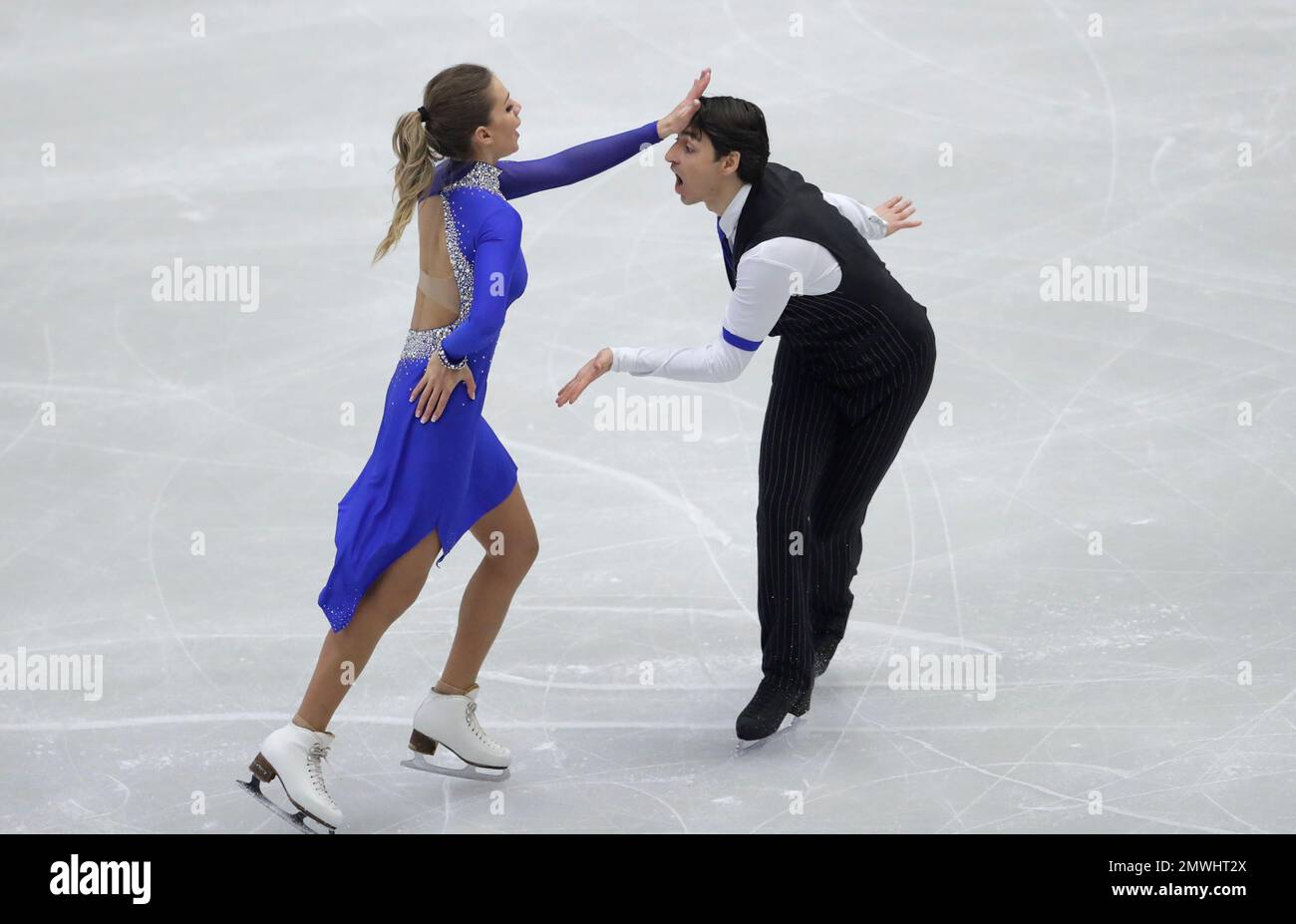 Alisa Agofonova and Alper Ucar, of Turkey, skate their short dance at ...