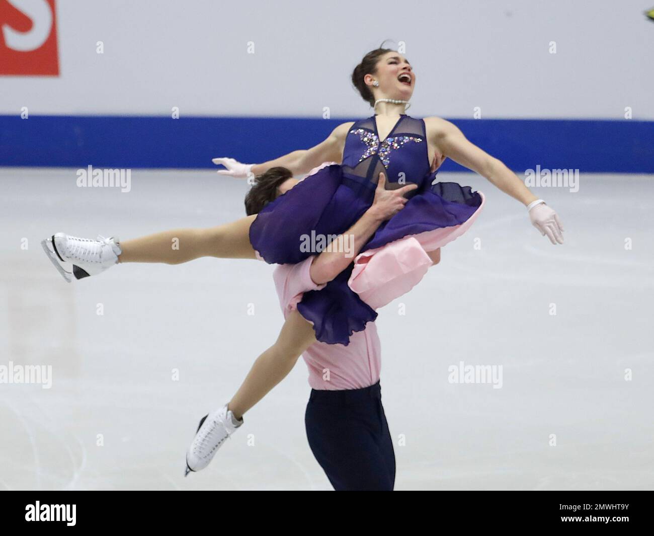 Laurence Fournier Beaudry and Nikolaj Sorensen, of Denmark, skate their ...