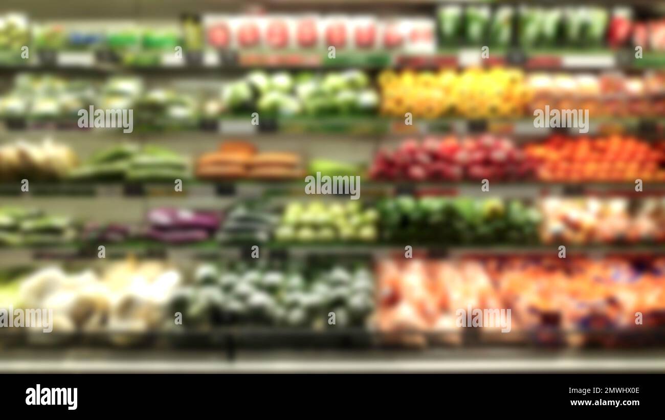 Abstract blur background of supermarket aisle shelves chilled vegetable ...