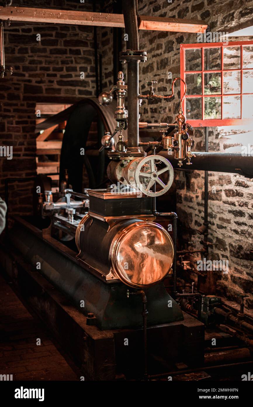 A vertical of an old factory in an old Canadian village in Quebec with ...