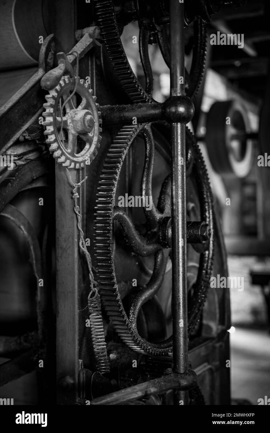A grayscale of an old factory in an old Canadian village in Quebec with ...