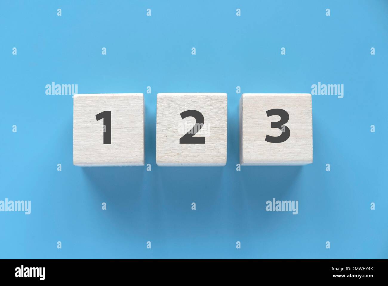 Wooden block with number of one, two and three Stock Photo - Alamy