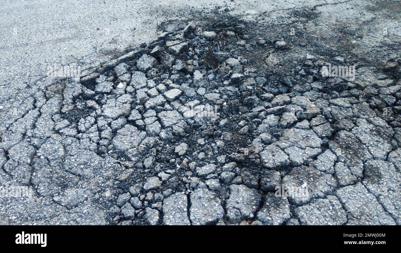 Asphalt road with crack. Damage and broken Stock Photo - Alamy