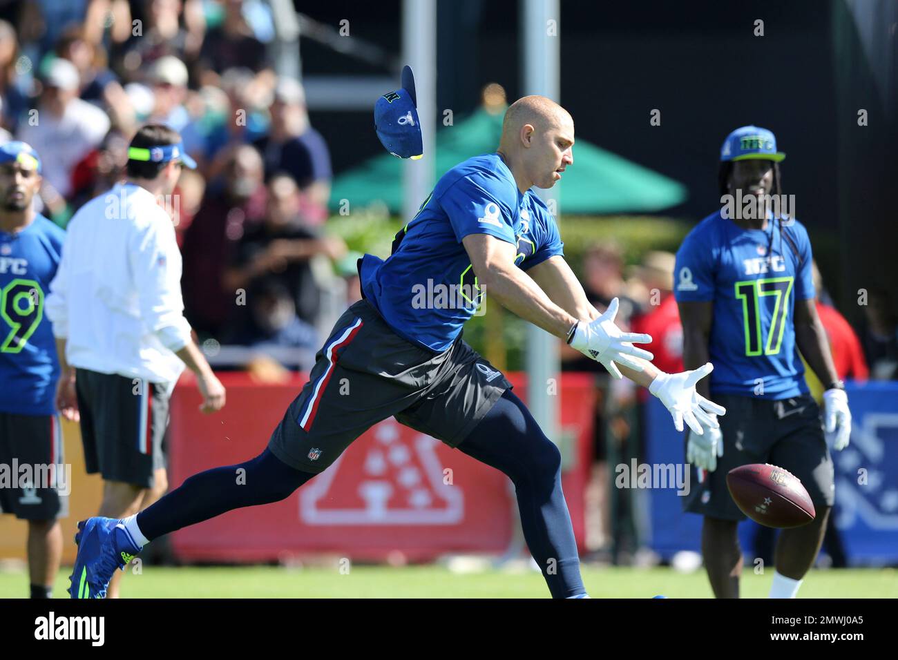 Seattle Seahawks Jimmy Graham #88 drops a pass and loses his hat at the ...