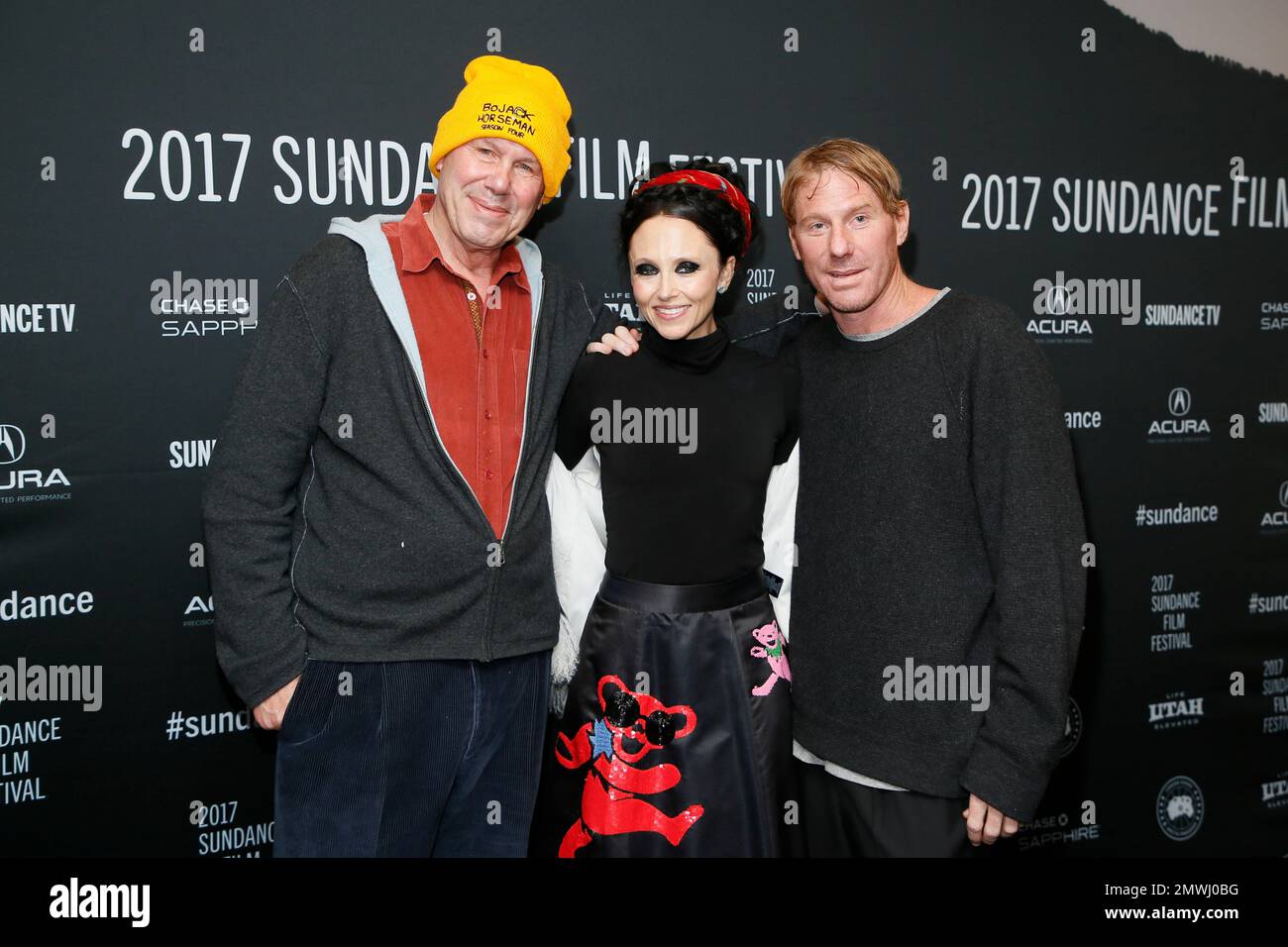 Michael Eisner, left, and his son producer Eric Eisner, right, and Eric ...