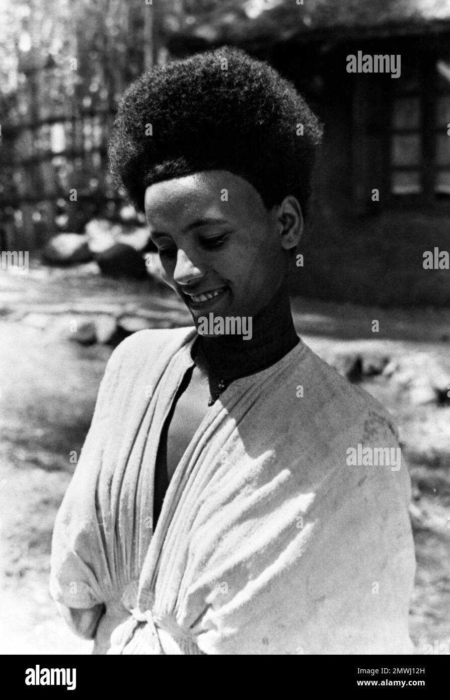 A young model poses for the photographer in the open air in Addis Ababa ...