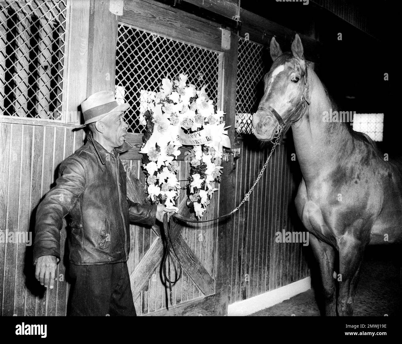 FILE - In this March 30, 1947, file photo, Groom Bob Groves leads Man O ...