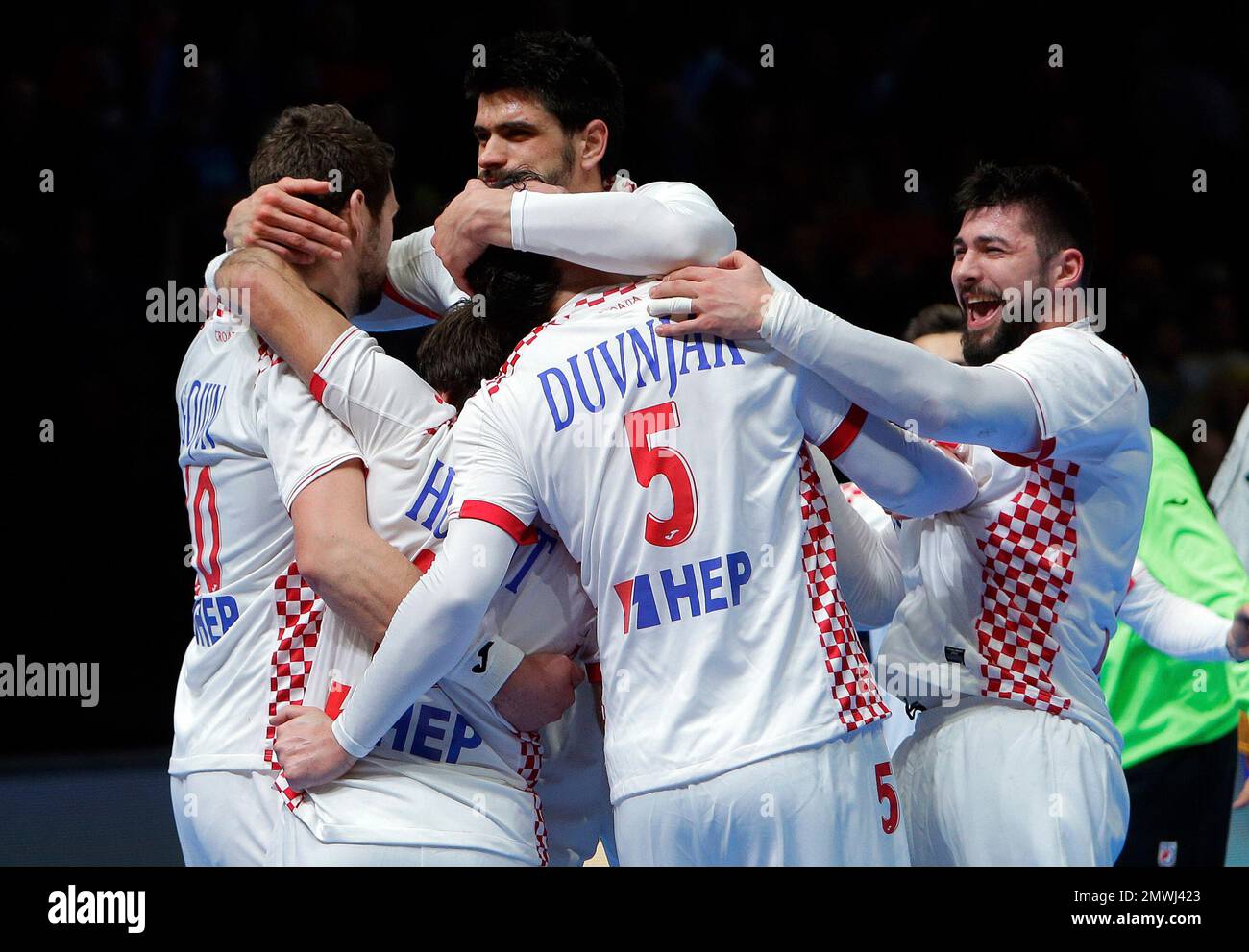Cratia'players celebrate after defeating Spain during the 25th men's ...