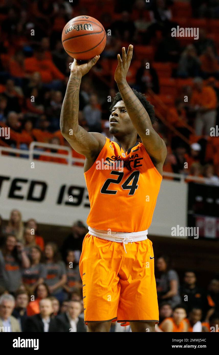 Oklahoma State guard Davon Dillard (24) shoots during an NCAA college ...