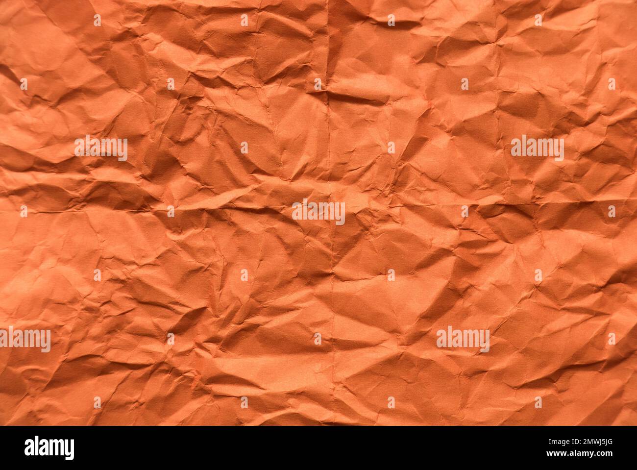Orange crumpled paper hi-res stock photography and images - Alamy