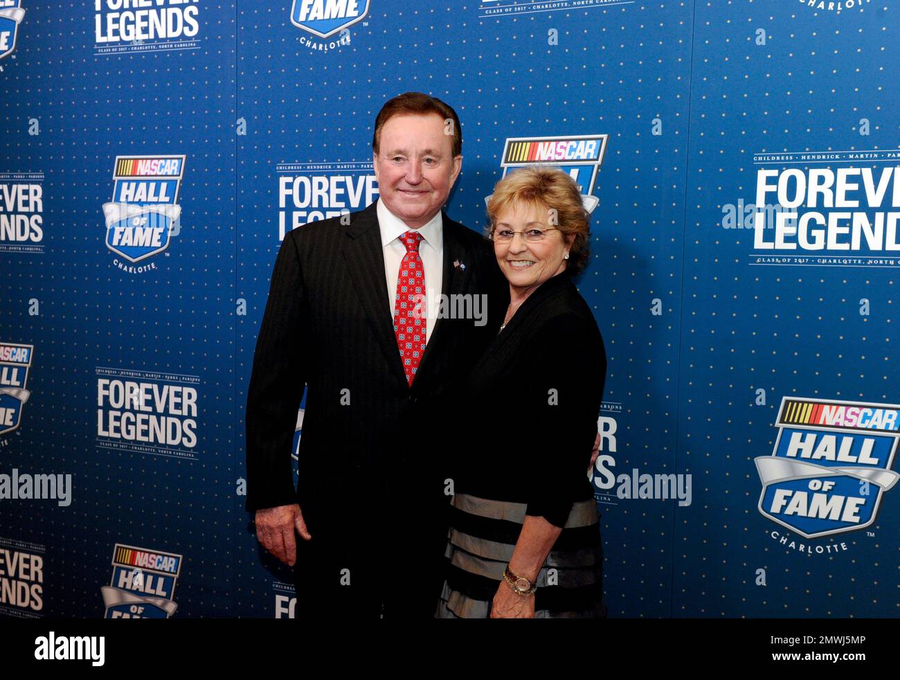 Richard Childress and wife, Judy, pose for photographers on the red ...