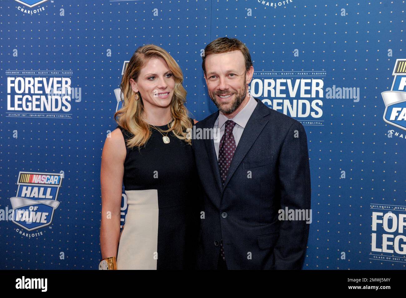 Matt Kenseth and his wife, Katie, pose for photographers on the red ...