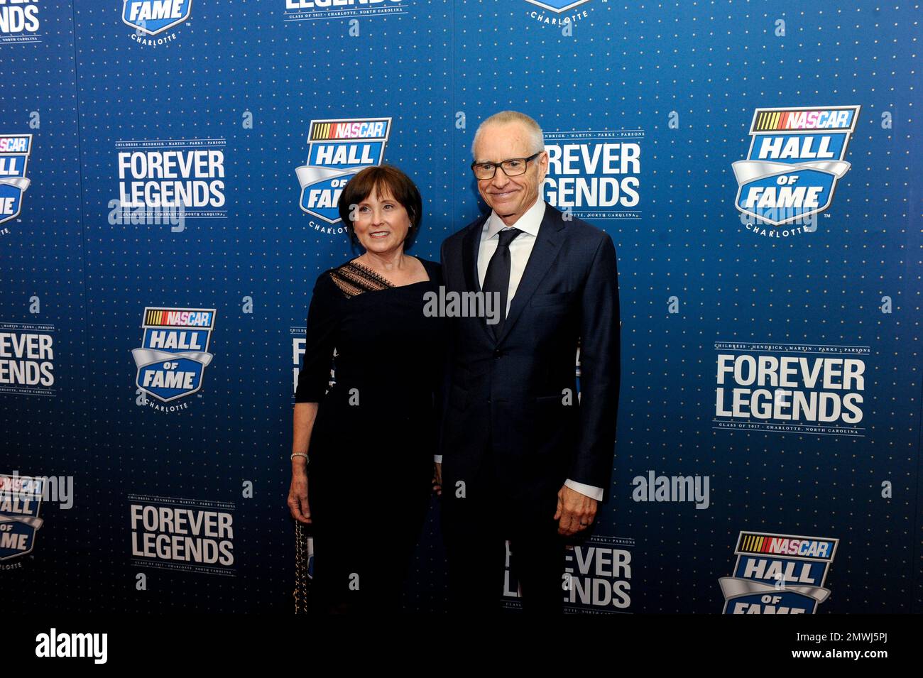Mark Martin, right, and his wife, Arlene, pose for photographers before ...