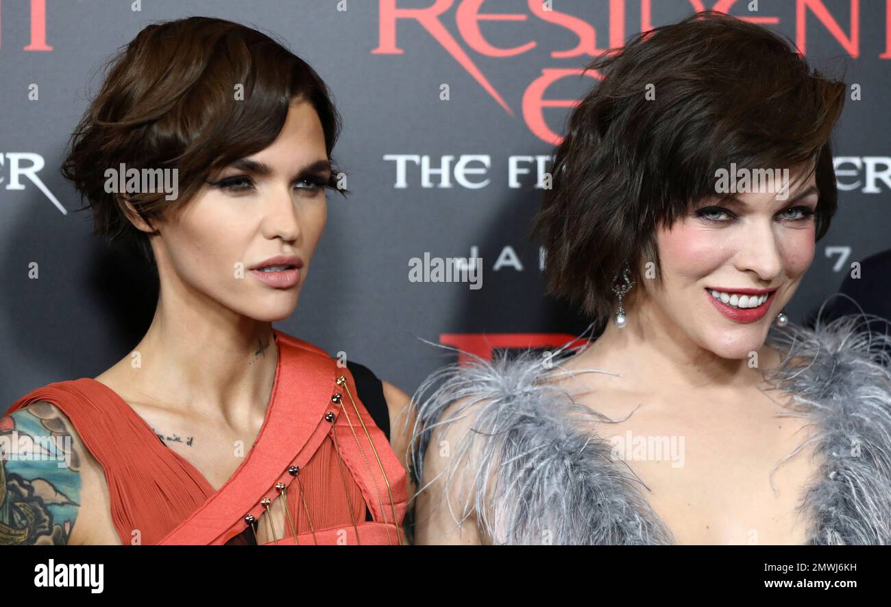 Ruby Rose, left, and Milla Jovovich arrive at the world premiere of ...