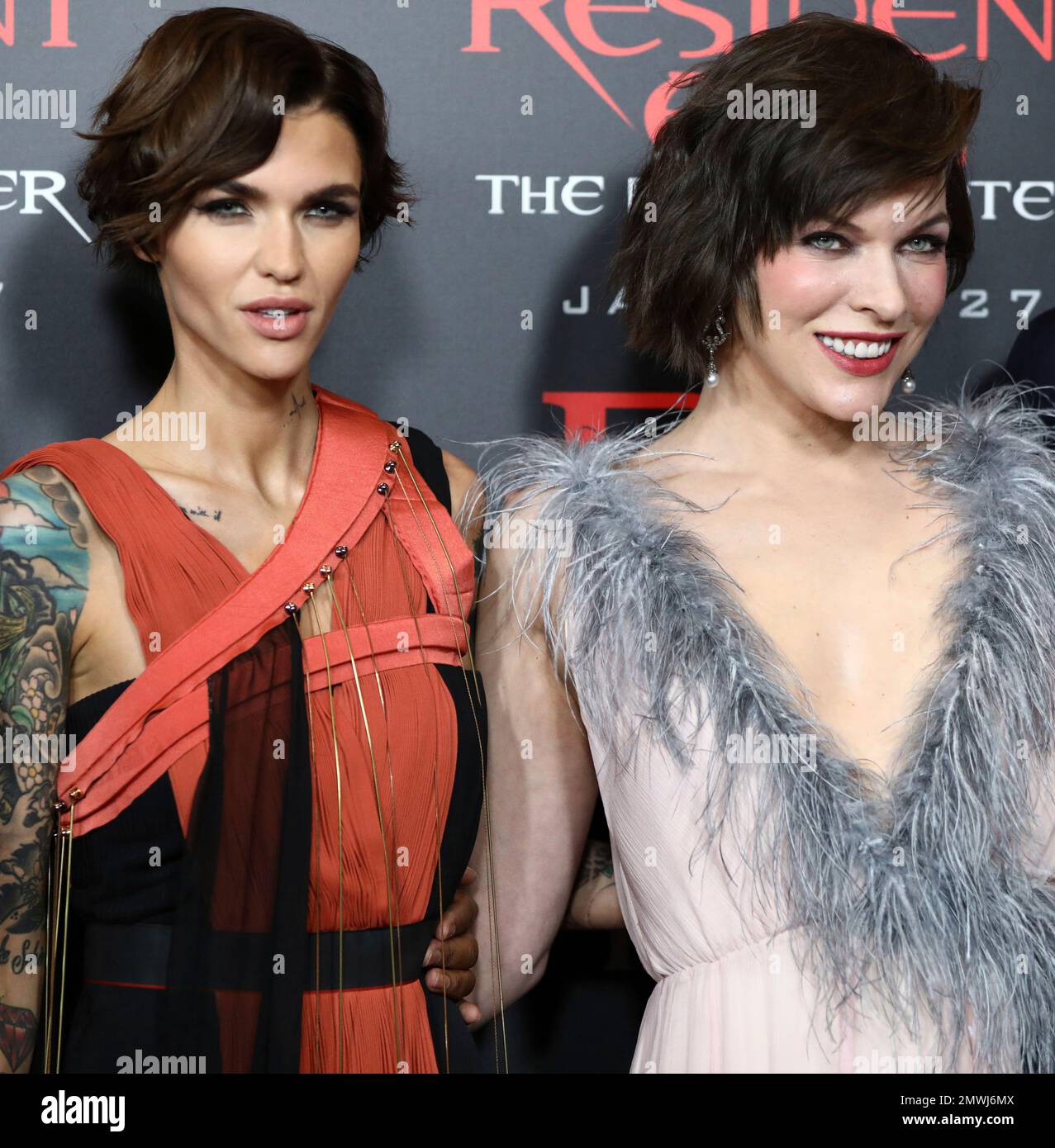 Ruby Rose, left, and Milla Jovovich arrive at the world premiere of ...