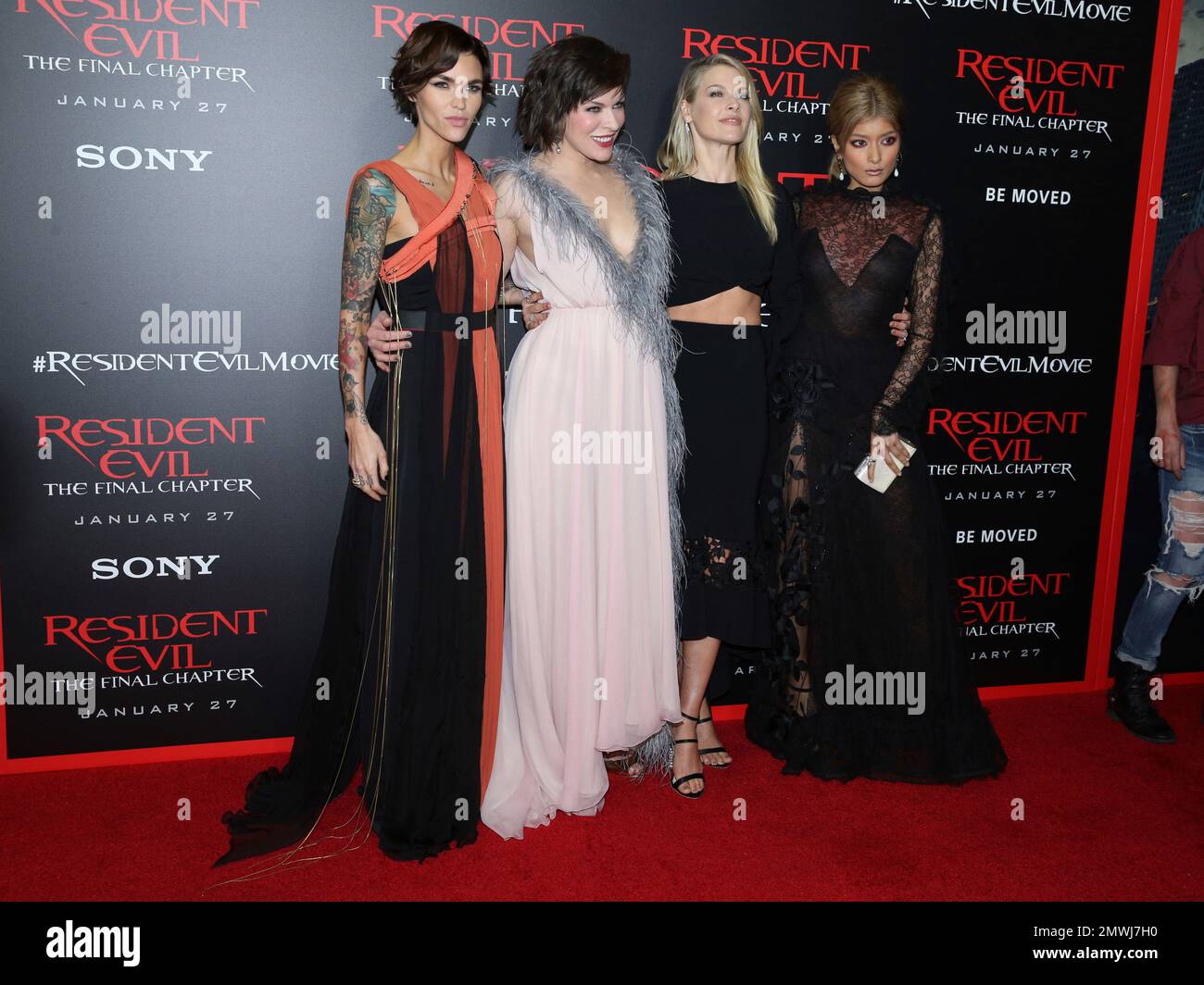 Ruby Rose, from left, Milla Jovovich, Ali Larter and Rola arrive at the ...