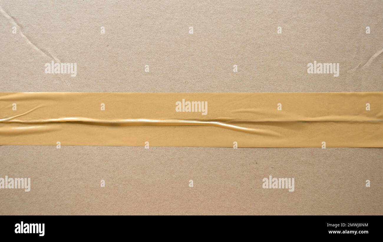 A box seal with adhesive tape Stock Photo - Alamy
