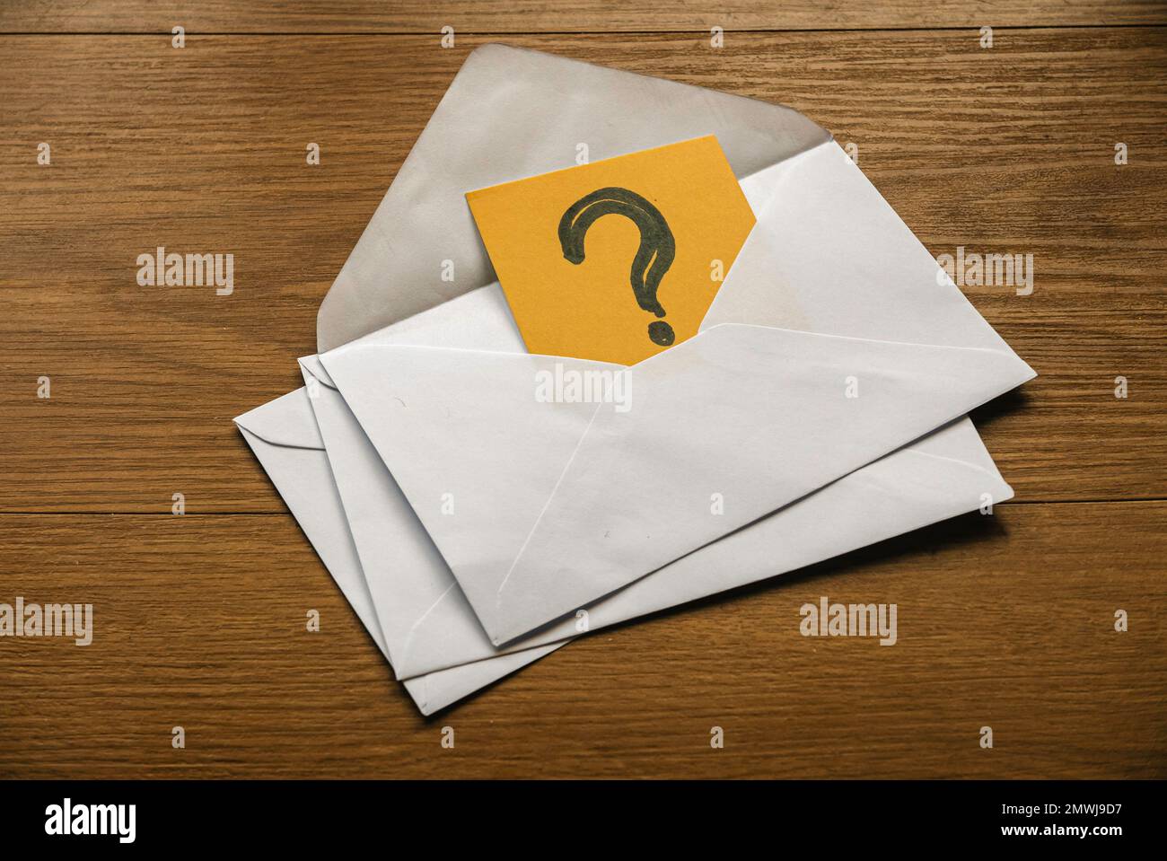 Question mark envelope hi-res stock photography and images - Alamy