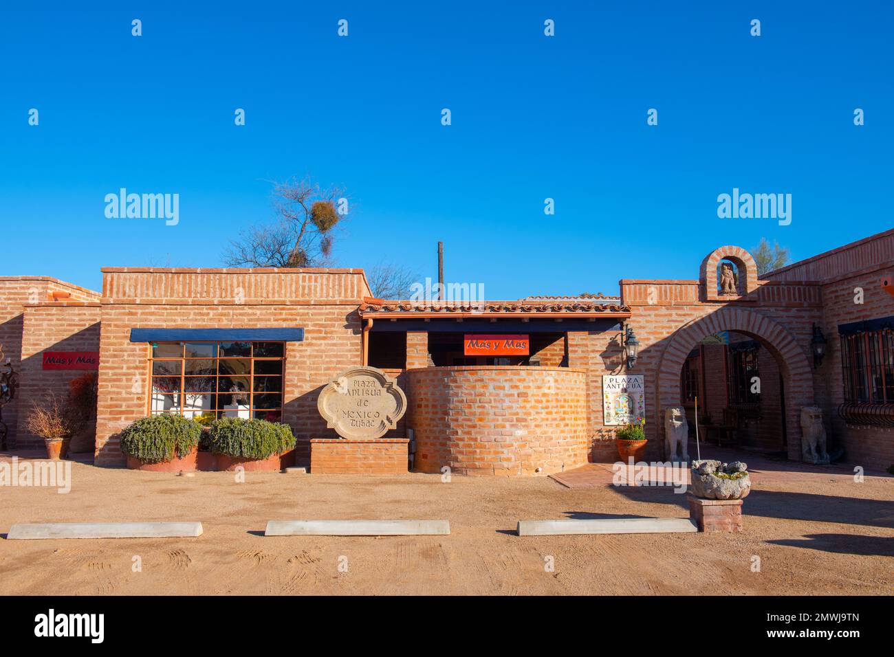 Historic adobe style buildings featured with handcraft arts around ...