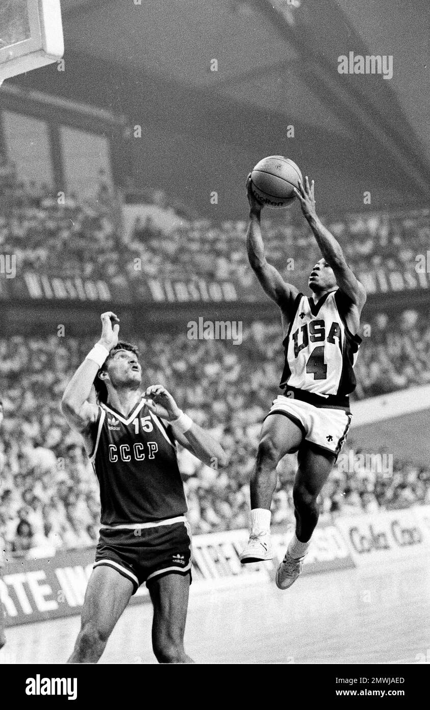 U.S. team captain Tyrone Bogues (4) grabs a rebound from Soviet Union ...