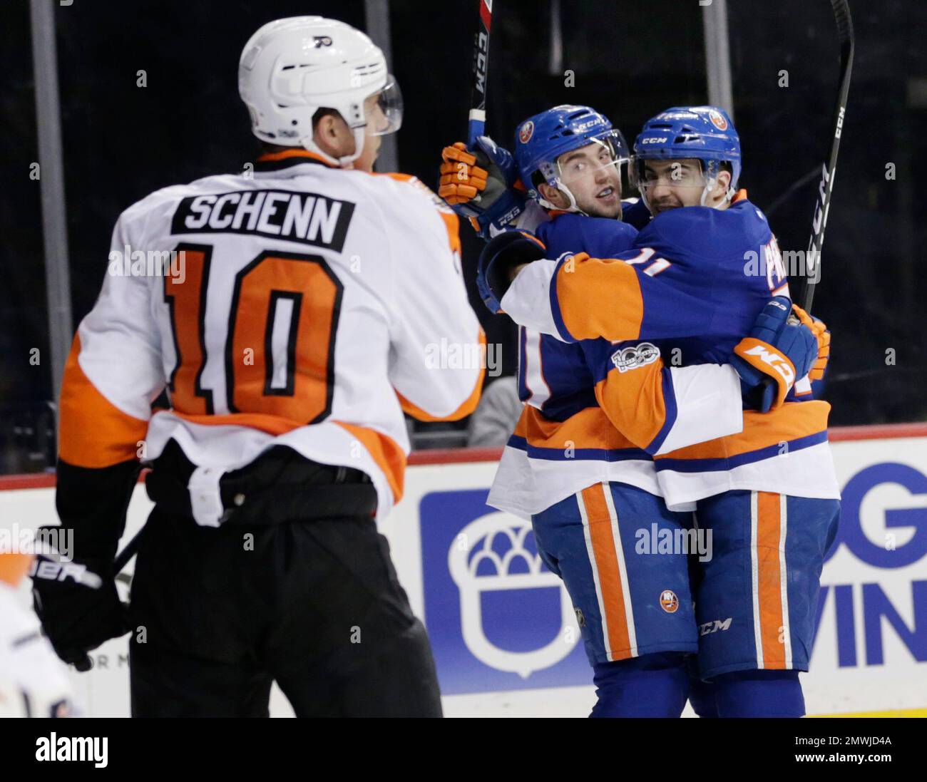 New York Islanders' Alan Quine, center, and Shane Prince celebrate ...