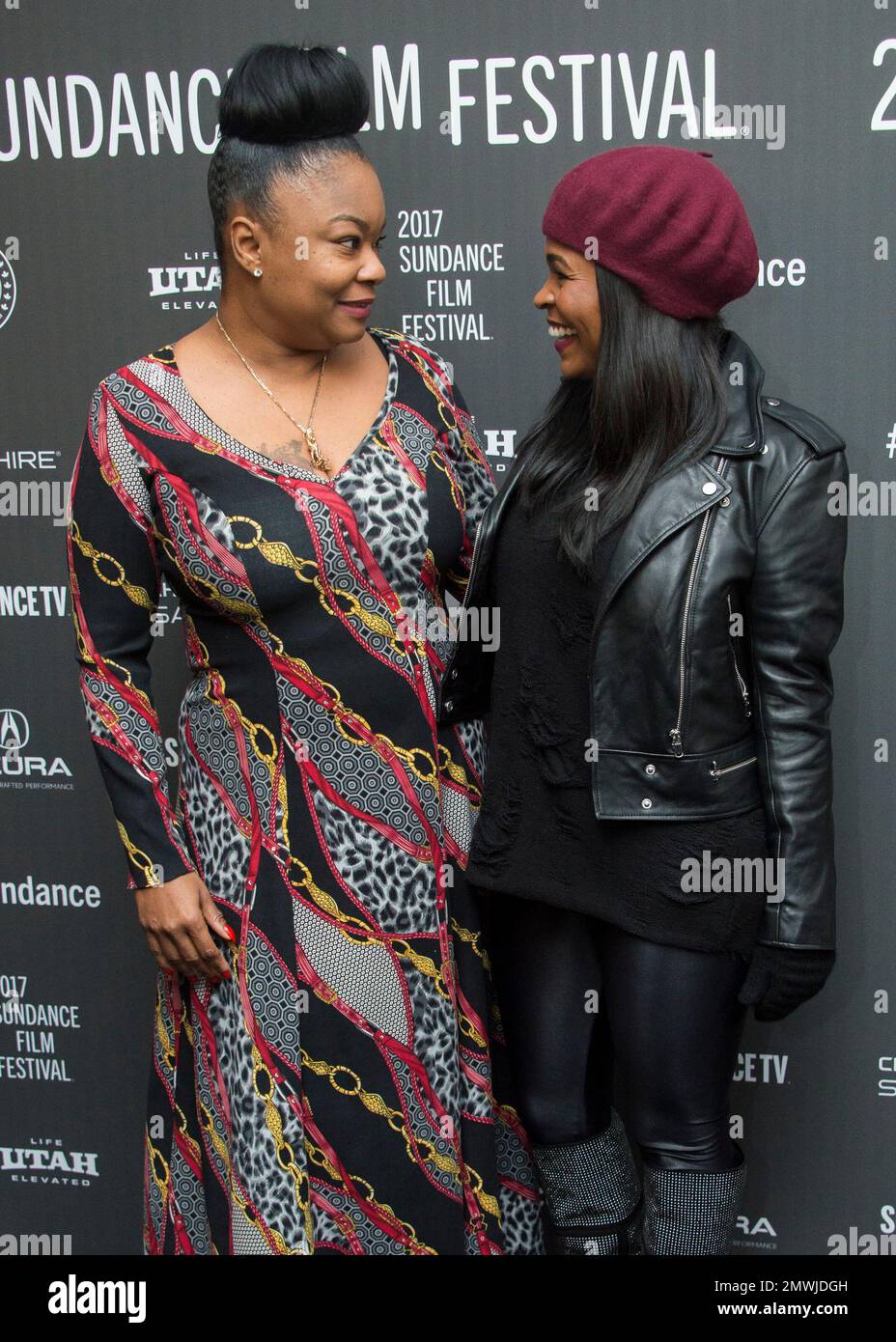 Roxanne Shanté, left, and actress Nia Long share a laugh at the ...