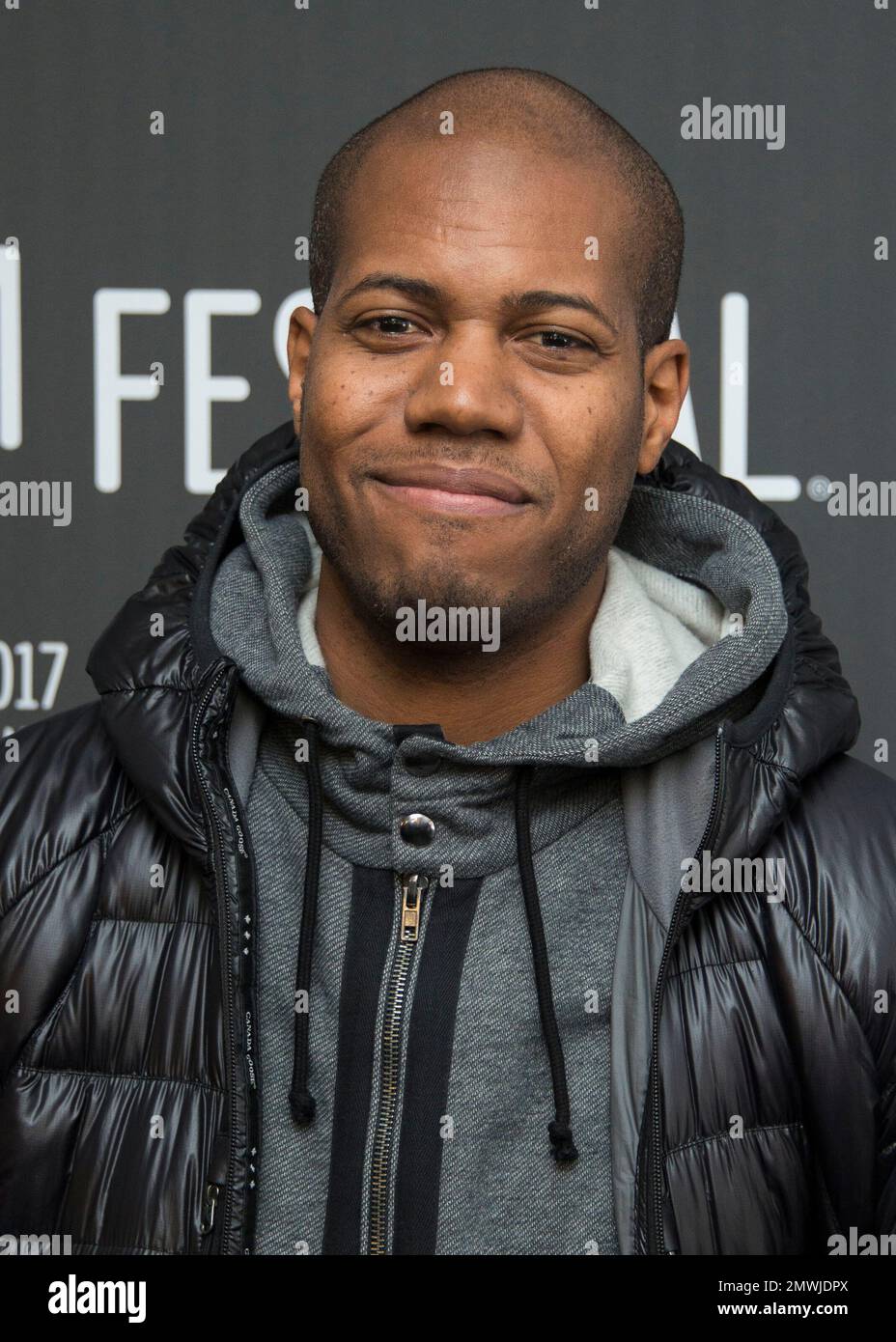 Director Michael Larnell poses at the premiere of the film "Roxanne ...