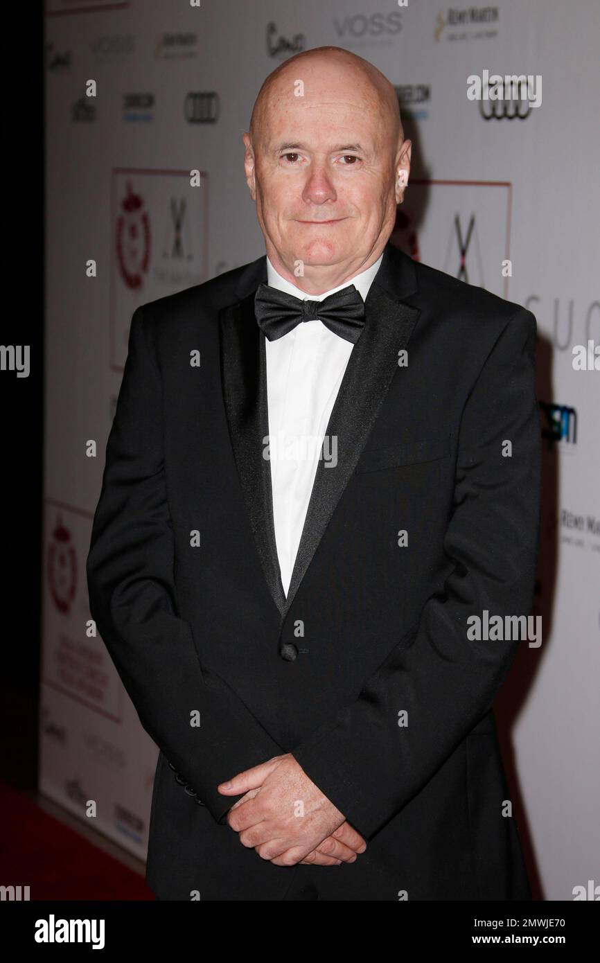 Dave Johns poses for photographers upon arrival at the 37th London ...