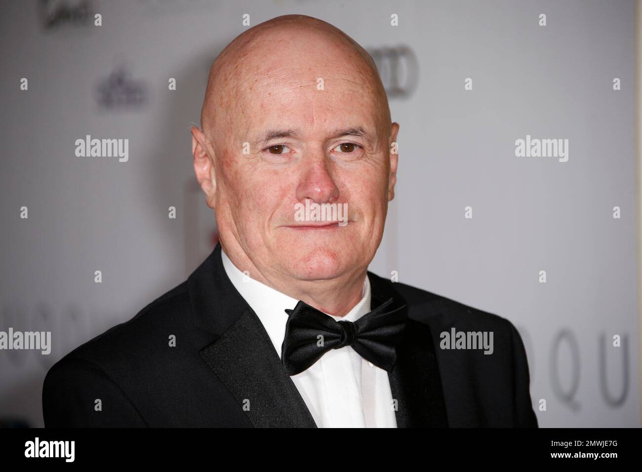 Dave Johns poses for photographers upon arrival at the 37th London ...