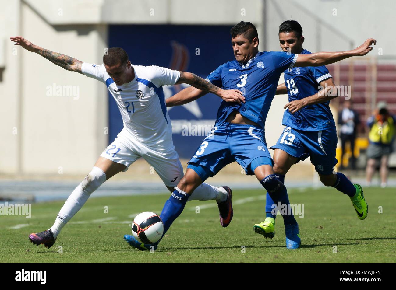Nicaragua's Jaime Moreno, left, El Salvador's Roberto Dominguez, center ...