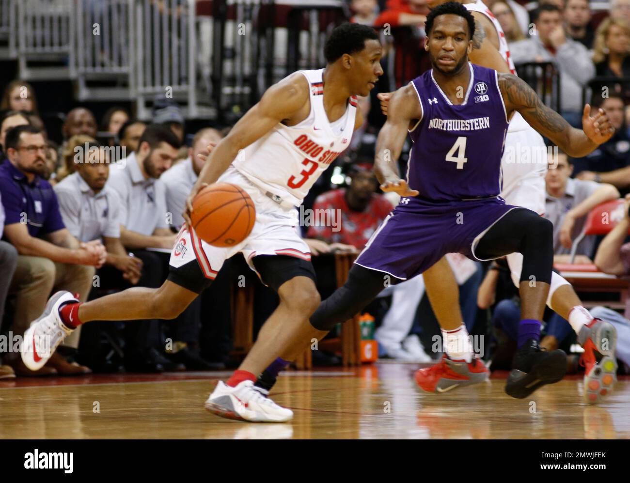 Ohio State's C.J. Jackson, left, tries to dribble past Northwestern's ...