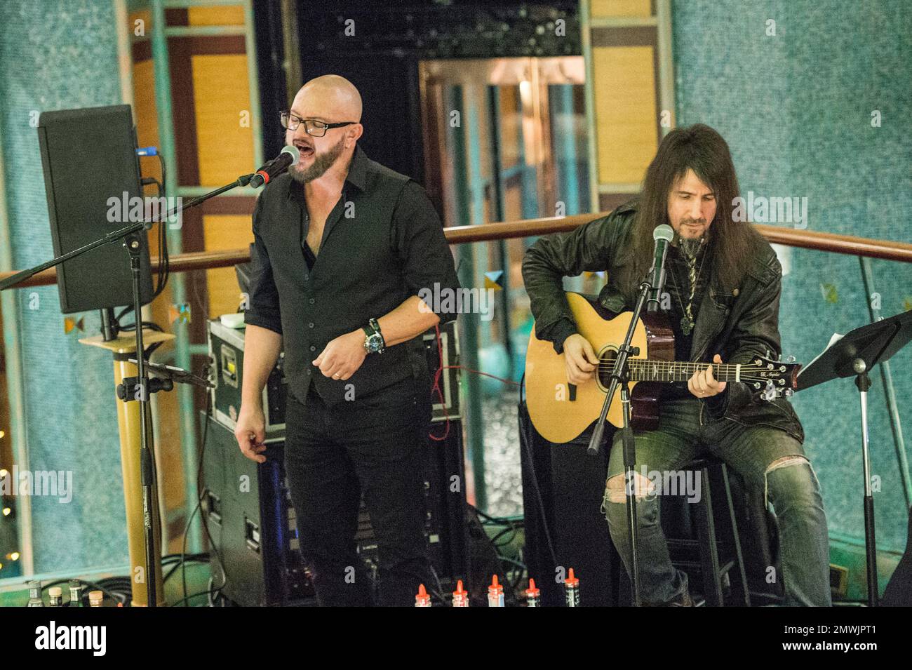 Geoff Tate, left, and Ron "Bumblefoot" Thal perform on board the ...