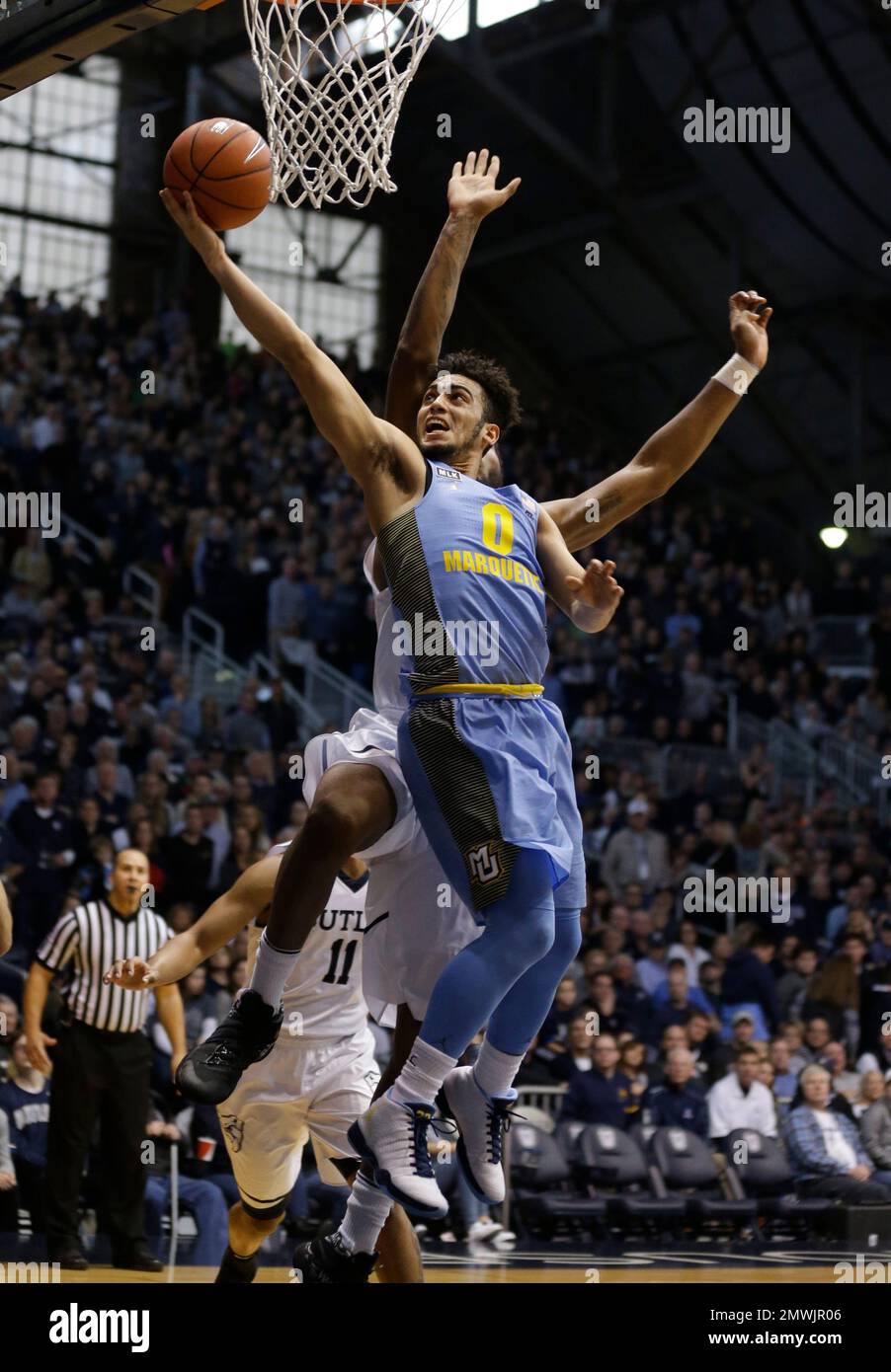 Marquette guard Markus Howard (0) shoots against Butler in the second ...