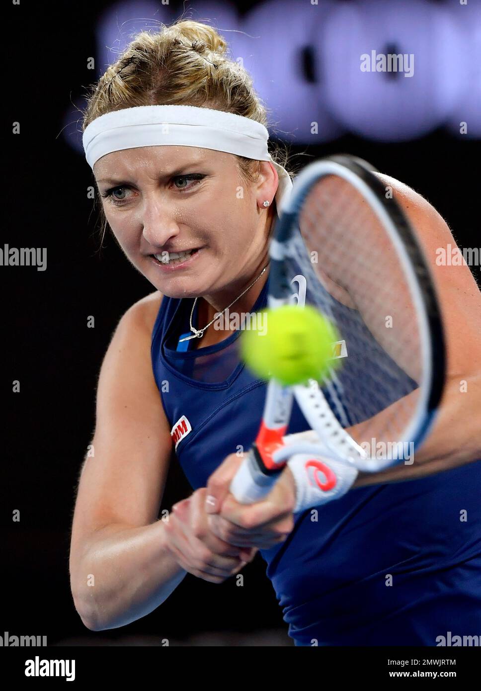 Switzerland's Timea Bacsinszky makes a backhand return to Australia's ...