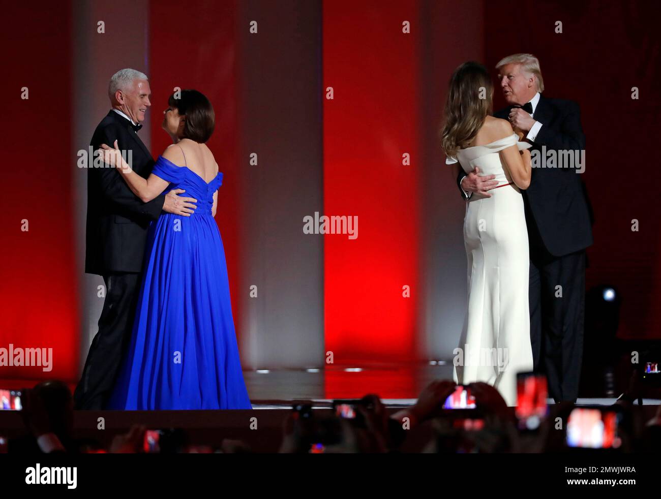 President Donald Trump, right, dances with first lady Melania Trump as ...