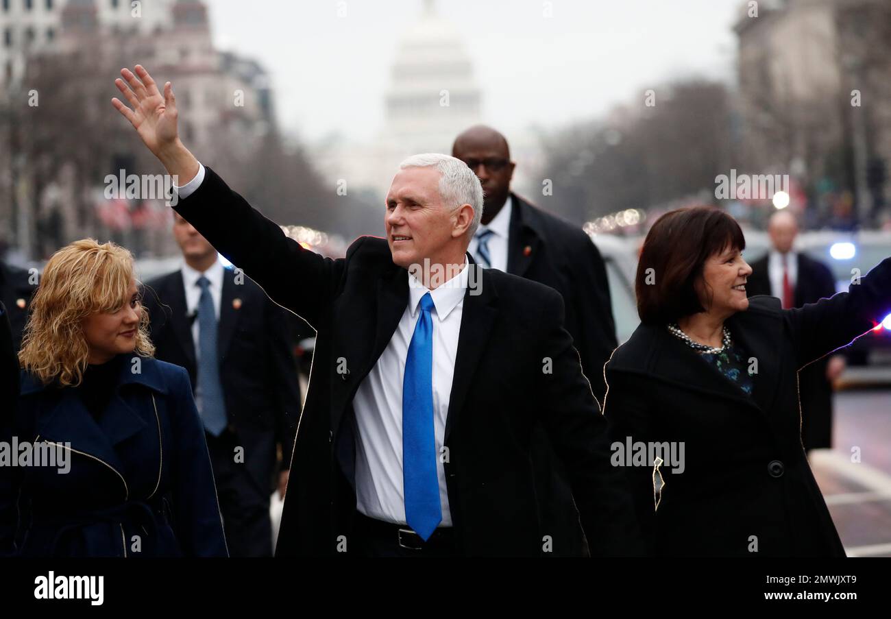 Vice President Mike Pence walks along Pennsylvania Avenue during the ...