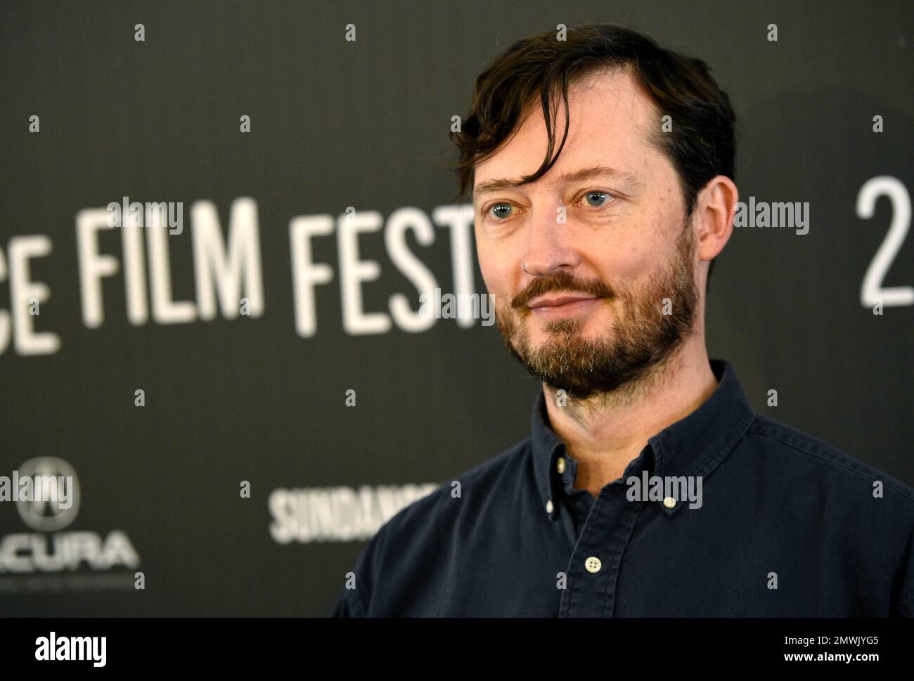 Dustin Guy Defa, writer/director of "Person to Person," poses at the ...