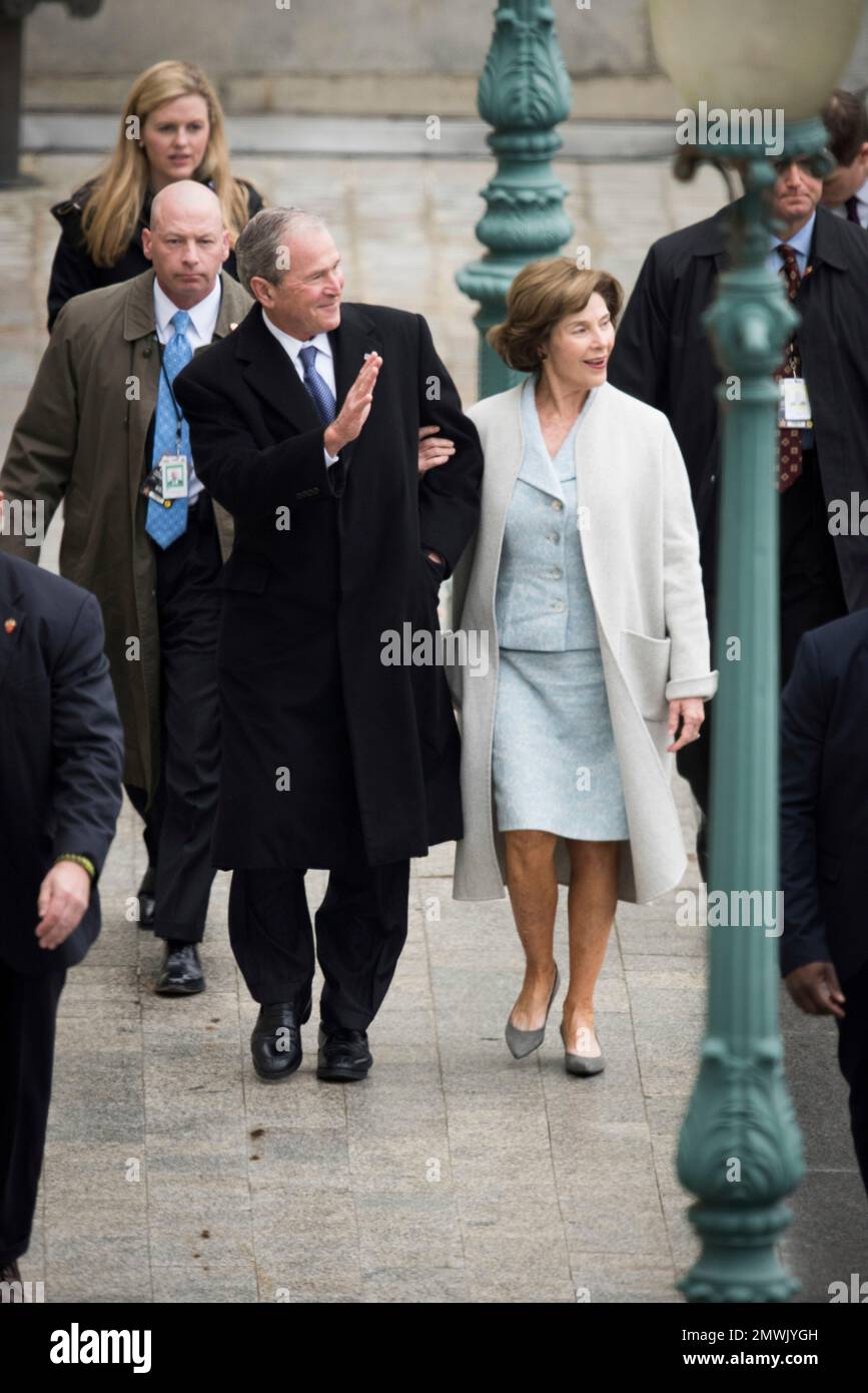 Former President George W. Bush and his wife Laura Bush arrive on ...