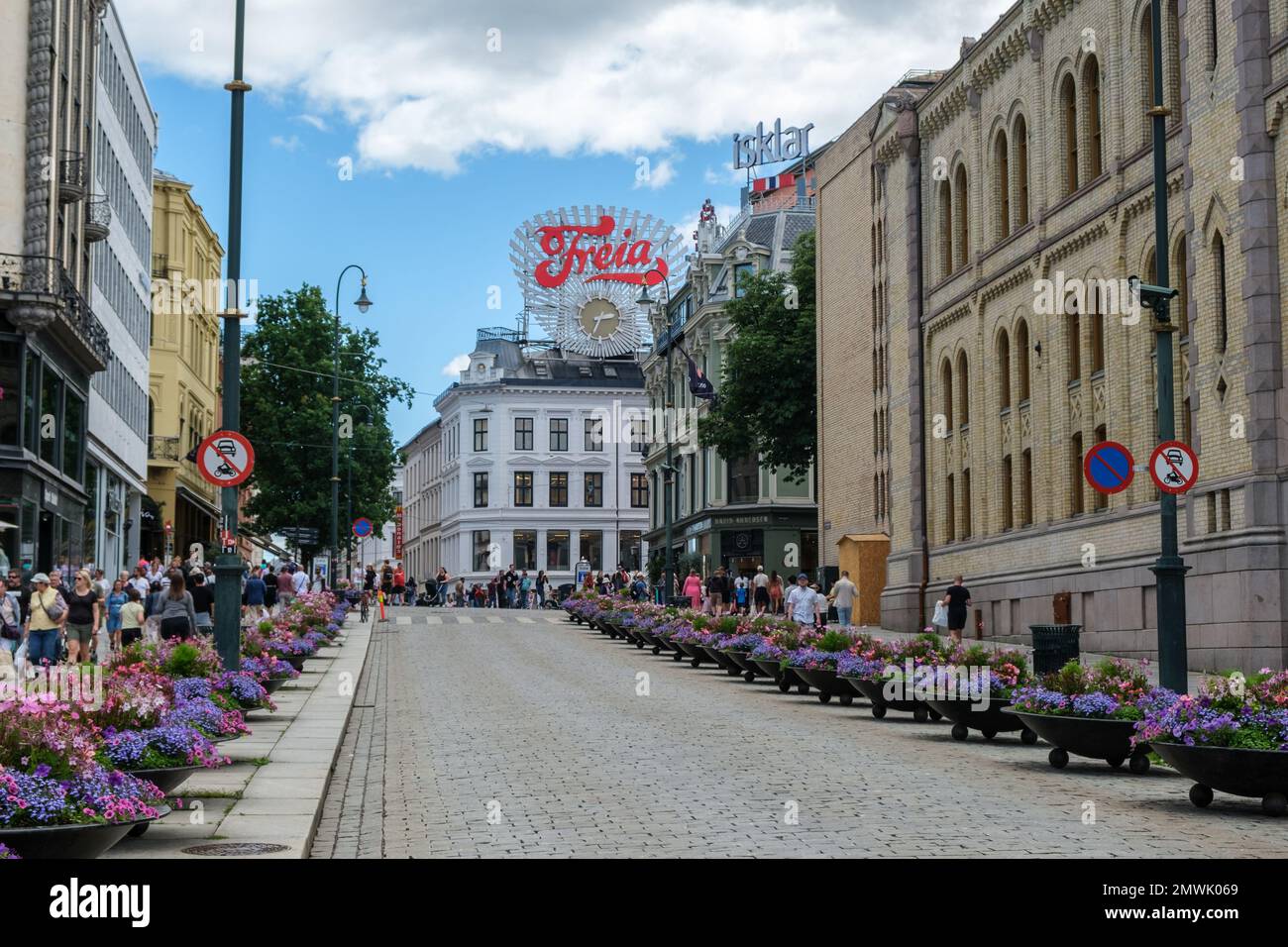 A famous street in the city center of Oslo with advertisements on the ...