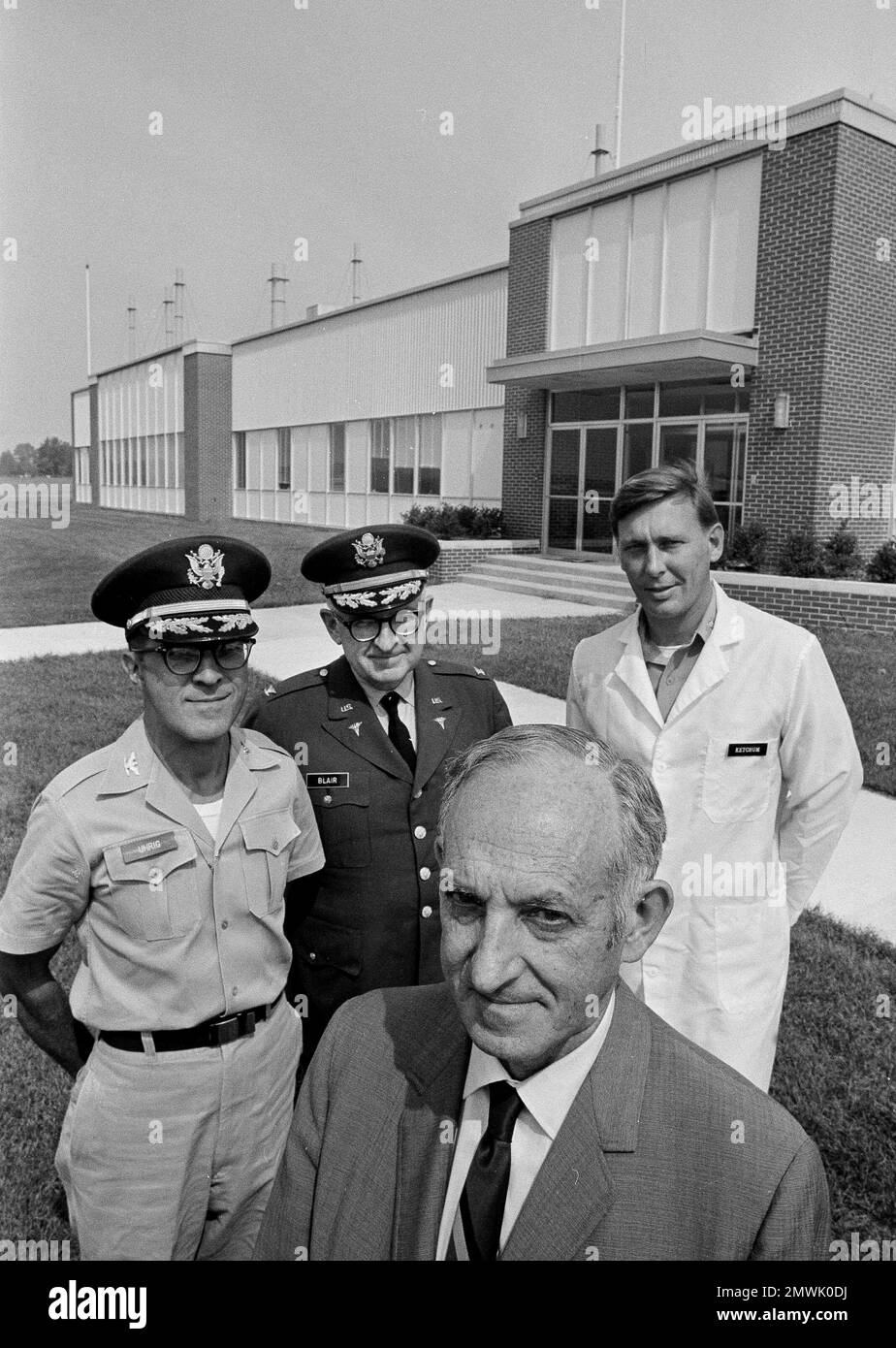 Dr. Seymour D. Silver, front, director of research labs at Edgewood, Md ...