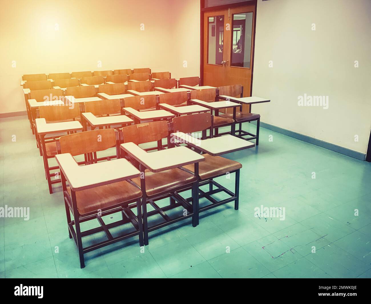 Wooden chairs in the classroom background Stock Photo - Alamy