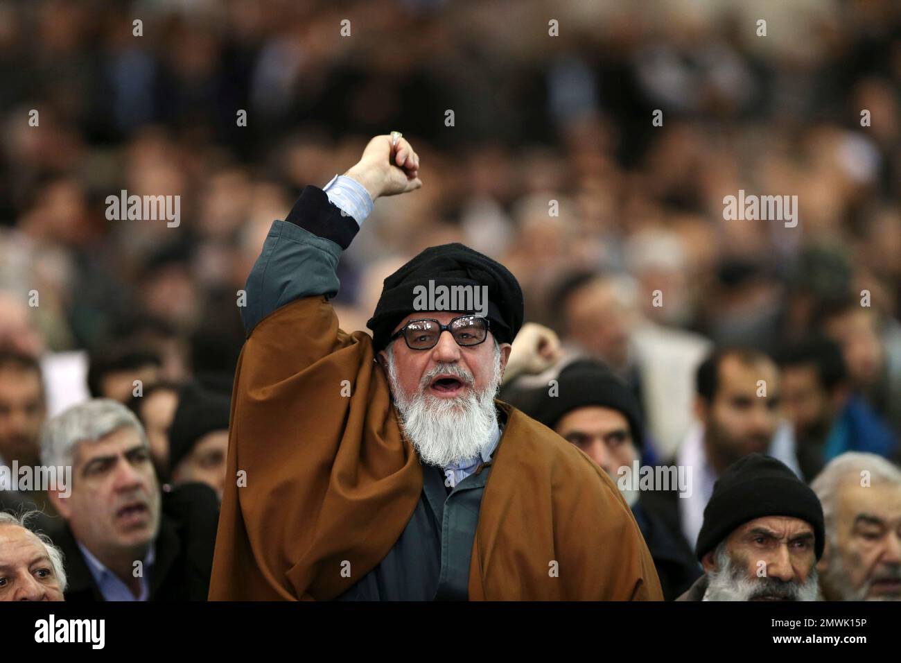 An Iranian worshipper chants slogans during Friday prayers at Imam ...