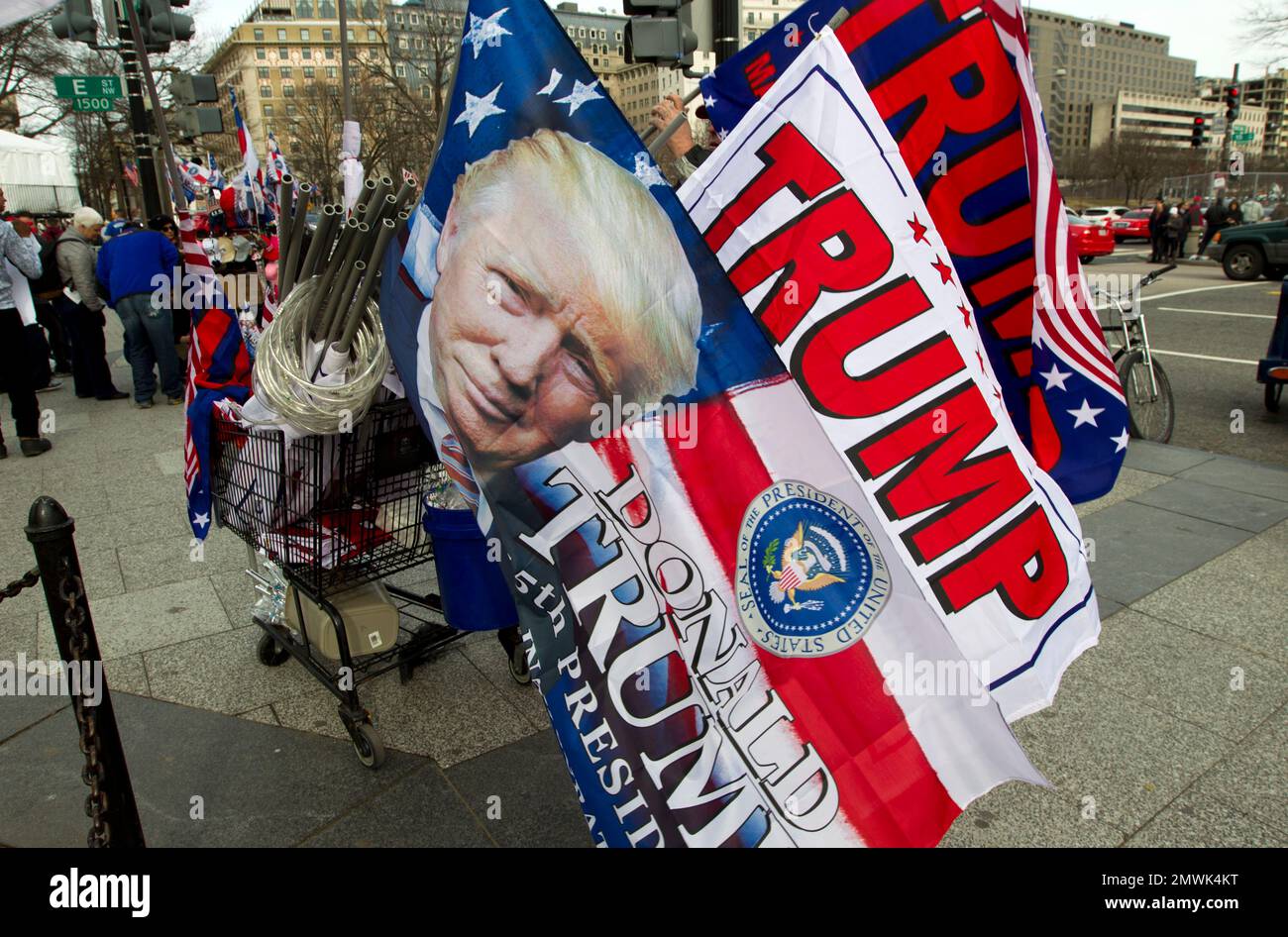 Flags with the image of President-elect Donald Trump are displayed for ...