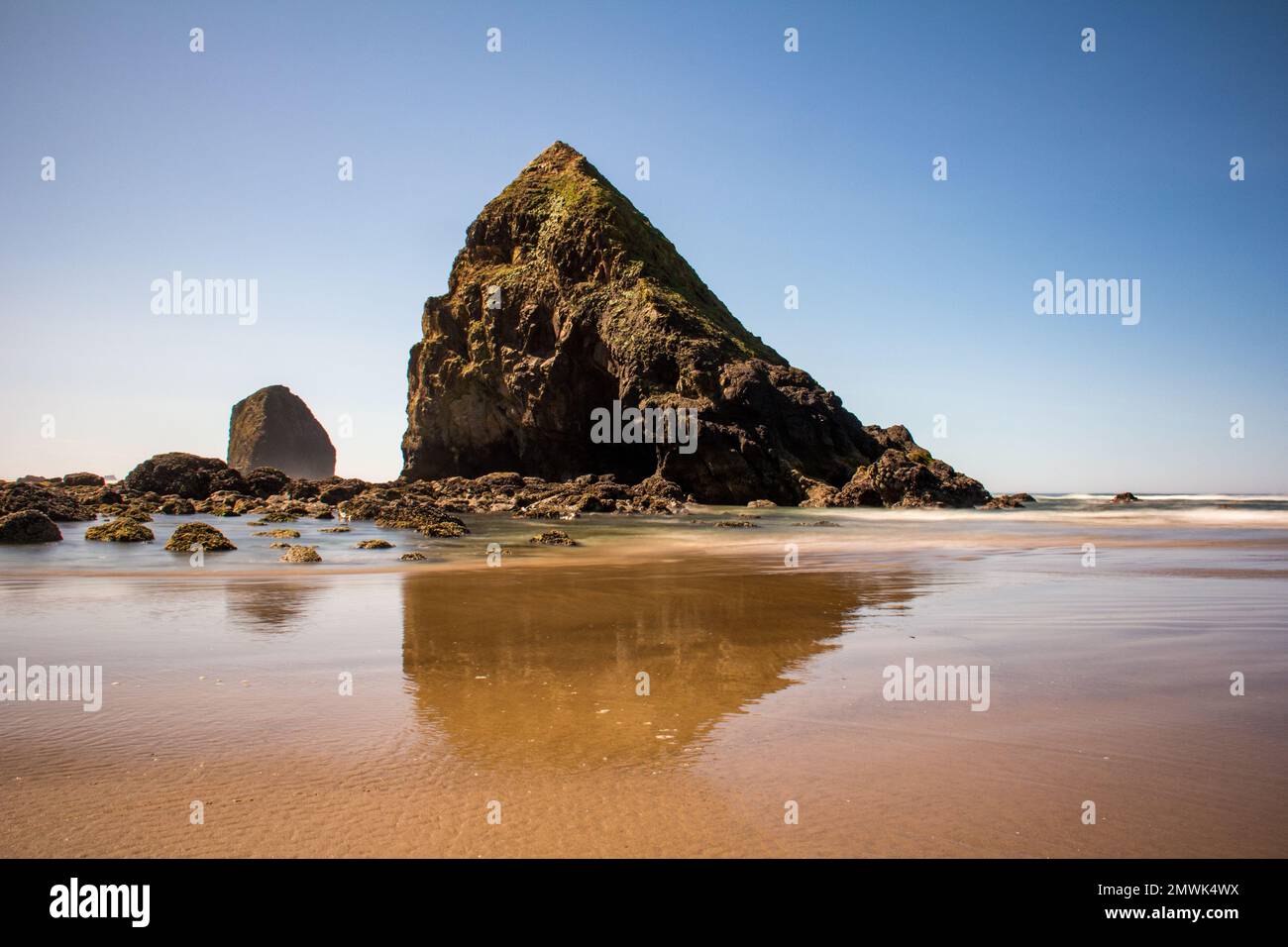 A view of the Haystack rock at the Canon Beach in Oregon Stock Photo ...