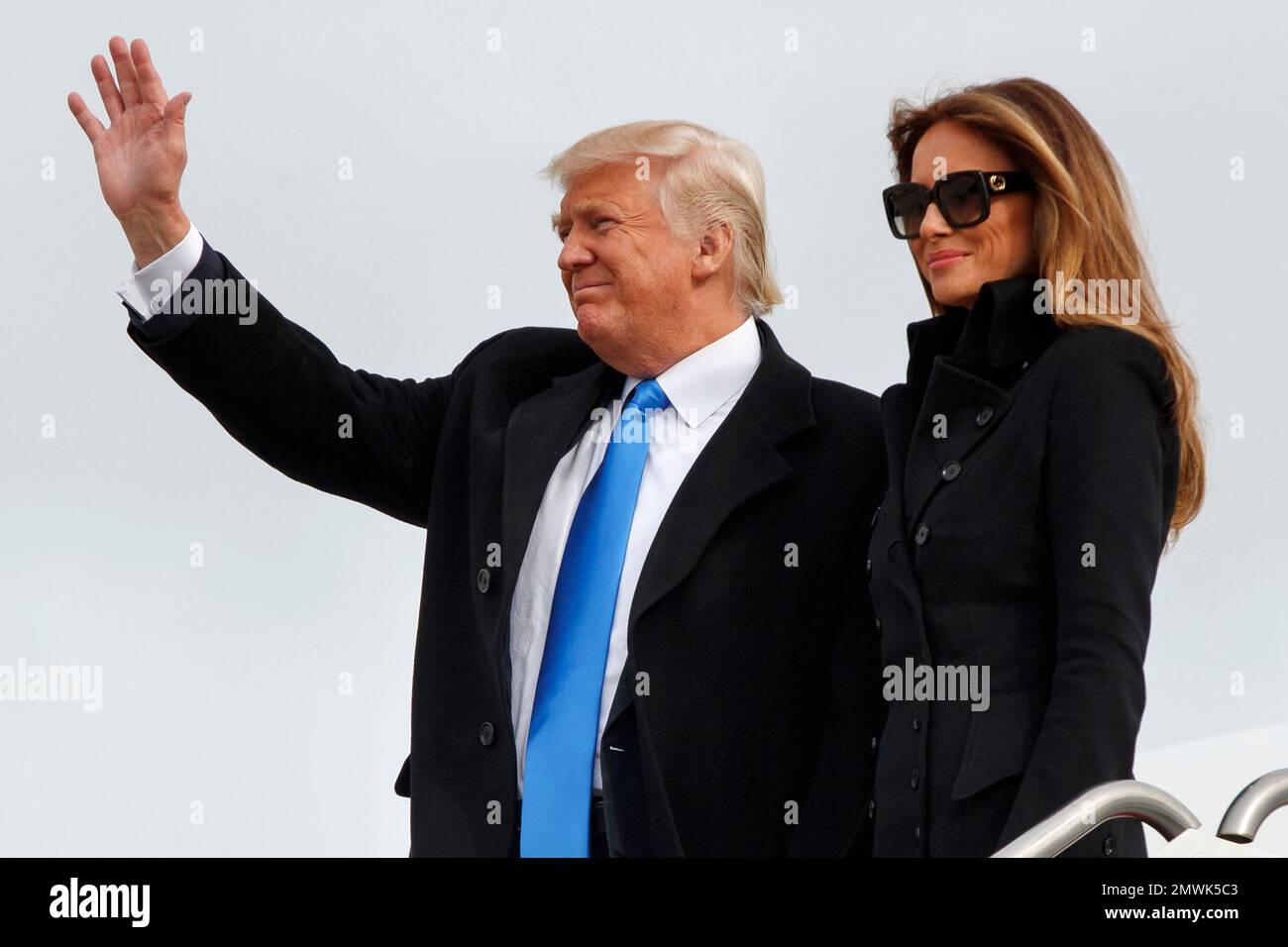 President-elect Donald Trump, accompanied by his wife Melania Trump ...