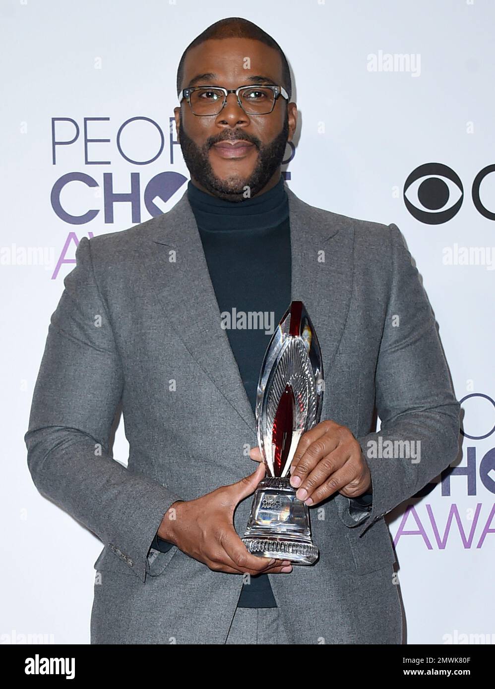 Tyler Perry poses in the press room with the award for favorite ...